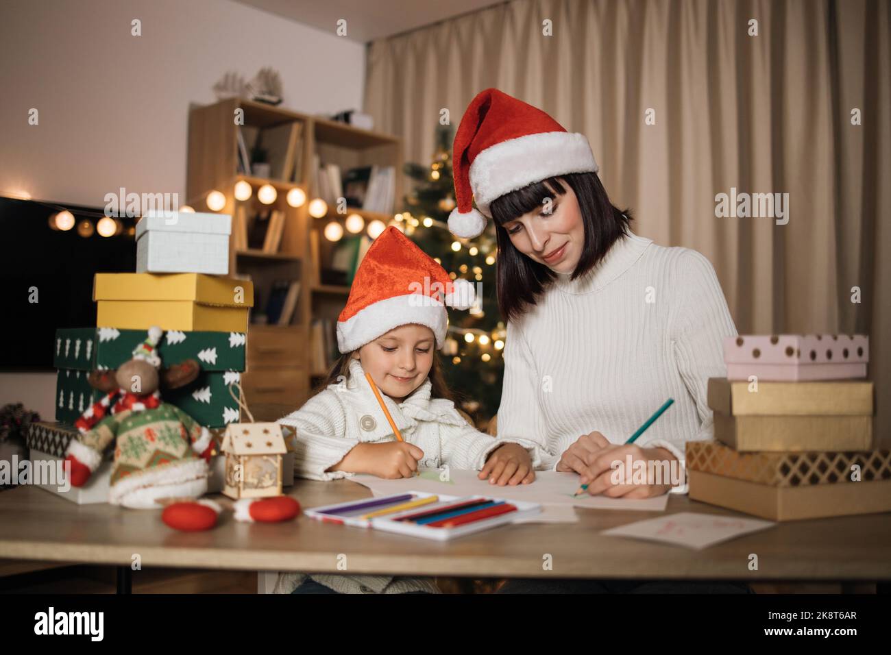 Happy family, young beautiful mother and little cute child daughter in ...