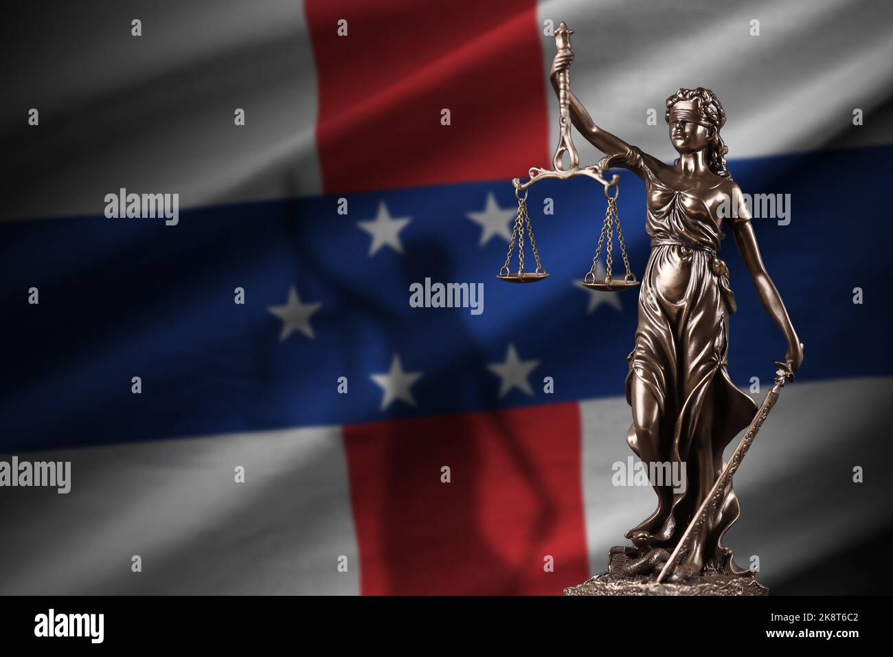 Netherlands Antilles flag with statue of lady justice and judicial ...