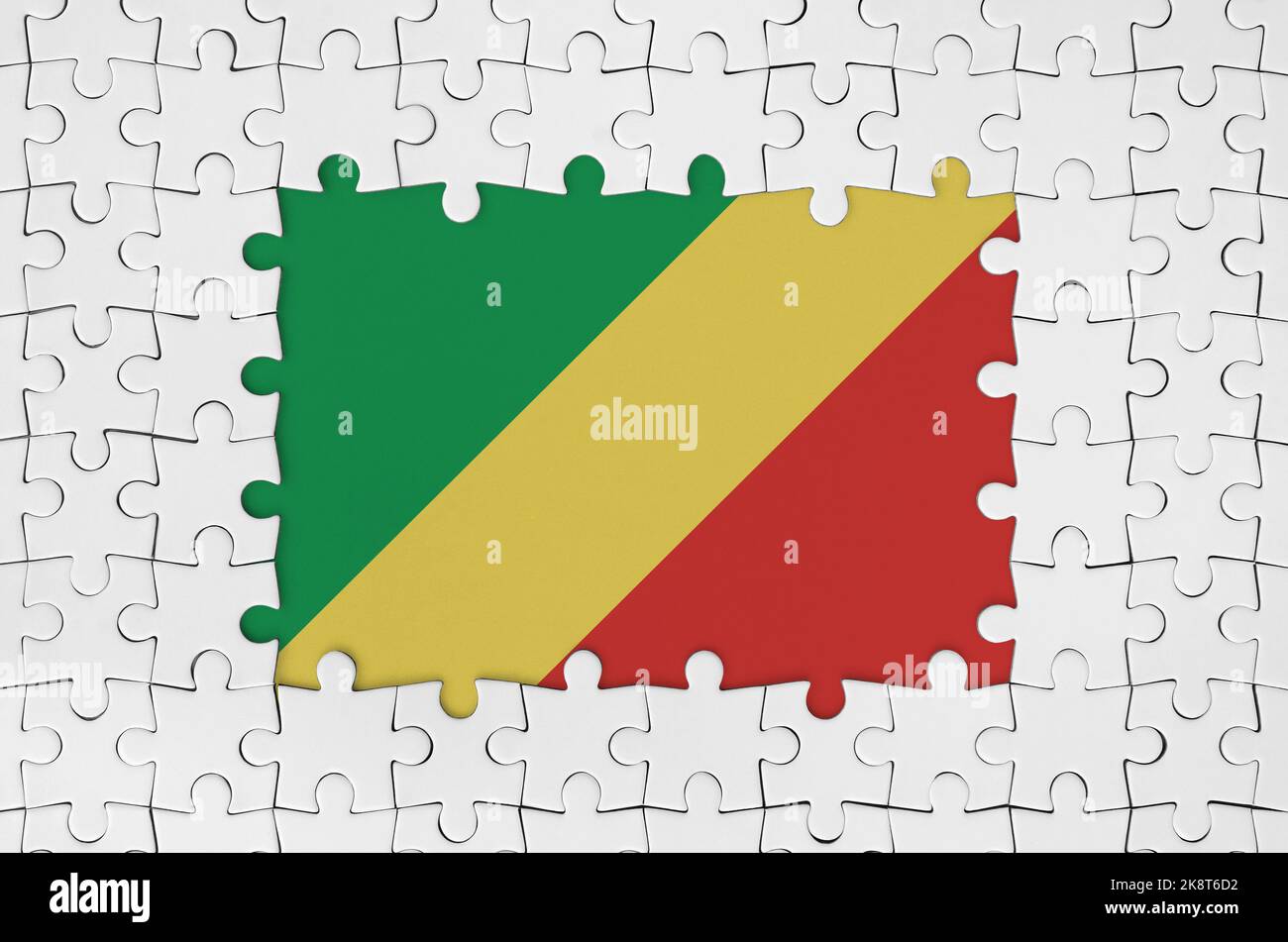 Congo flag in frame of white puzzle pieces with missing central parts ...