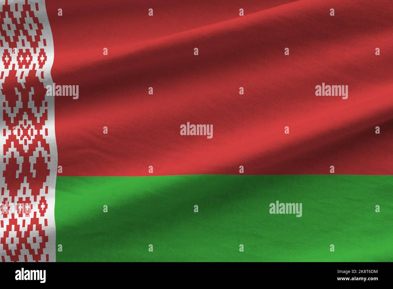 Belarus flag with big folds waving close up under the studio light ...