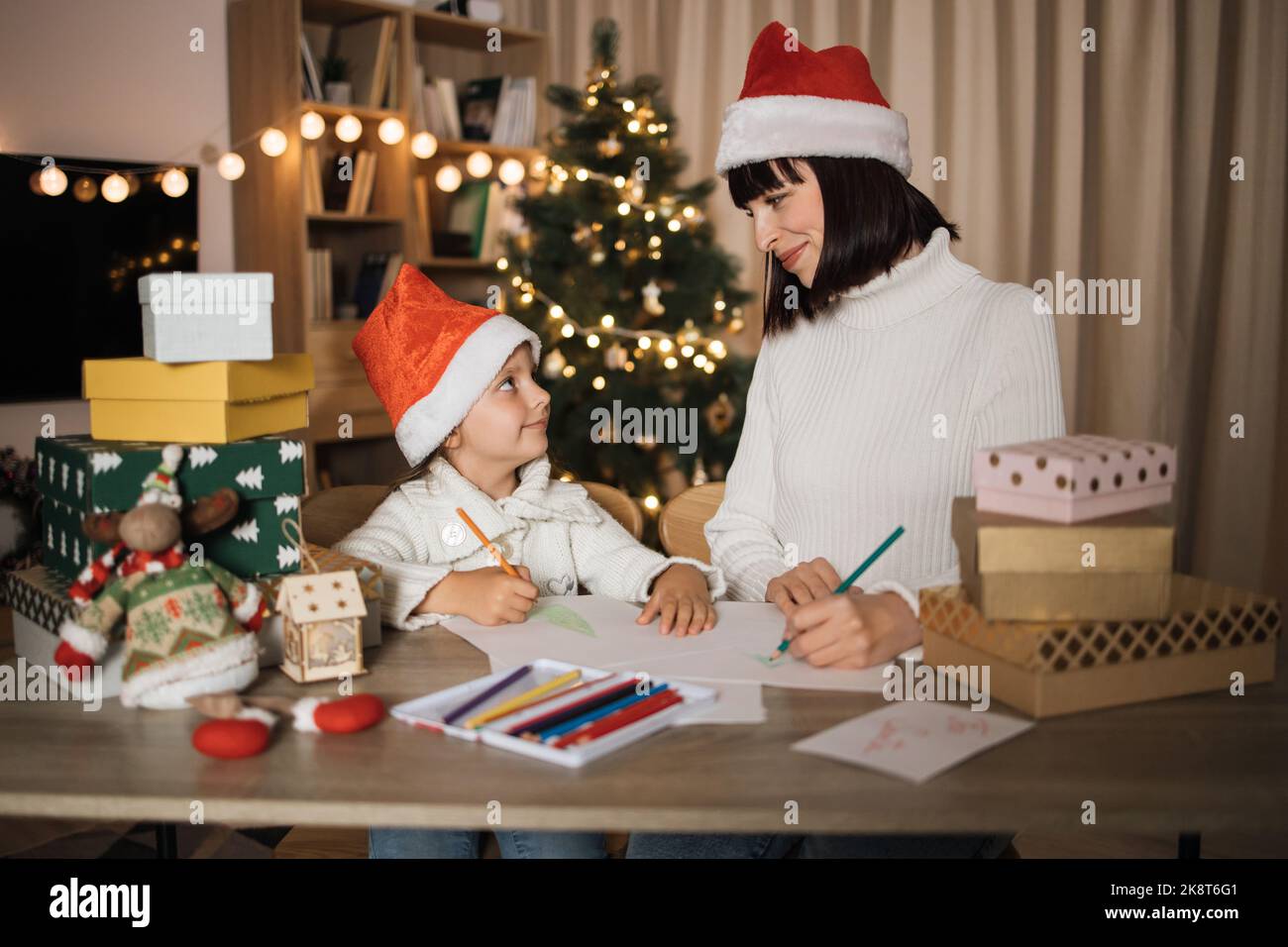 Happy family, young beautiful mother and little cute child daughter in ...