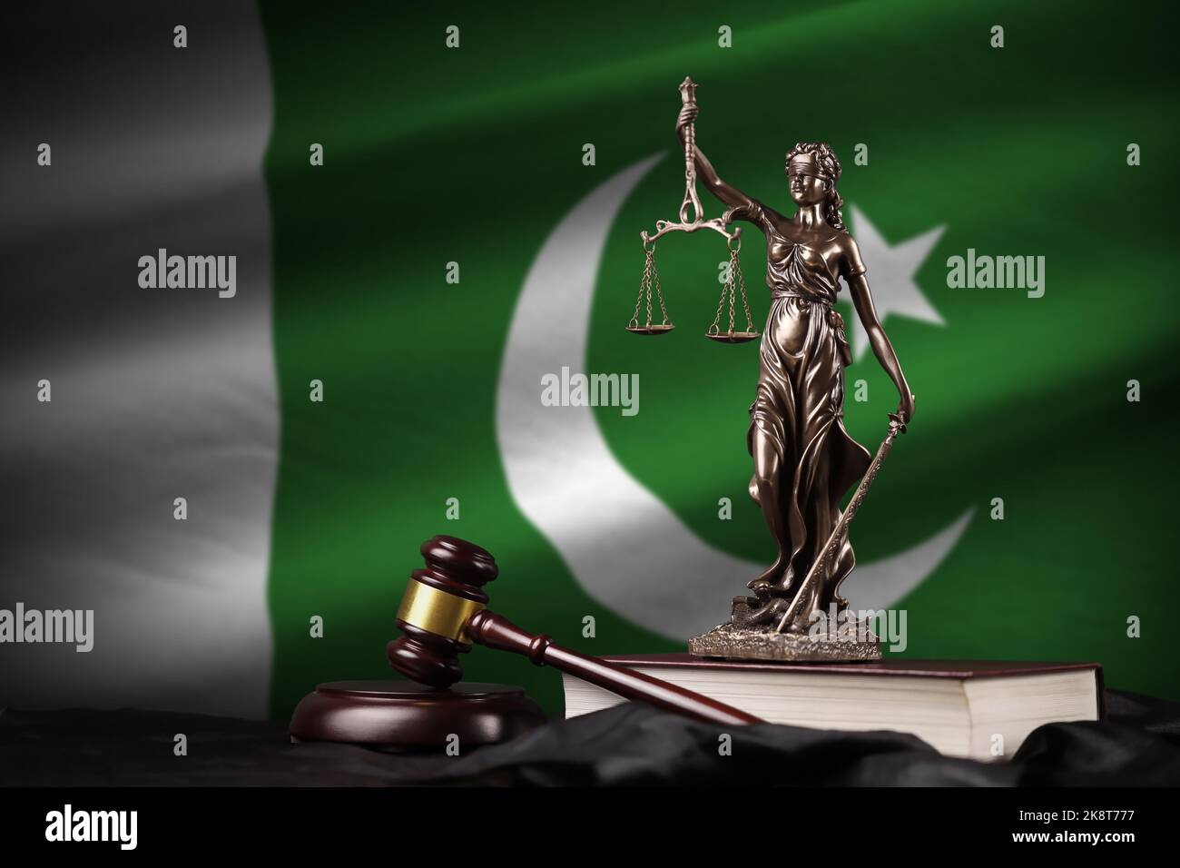 Pakistan flag with statue of lady justice, constitution and judge ...