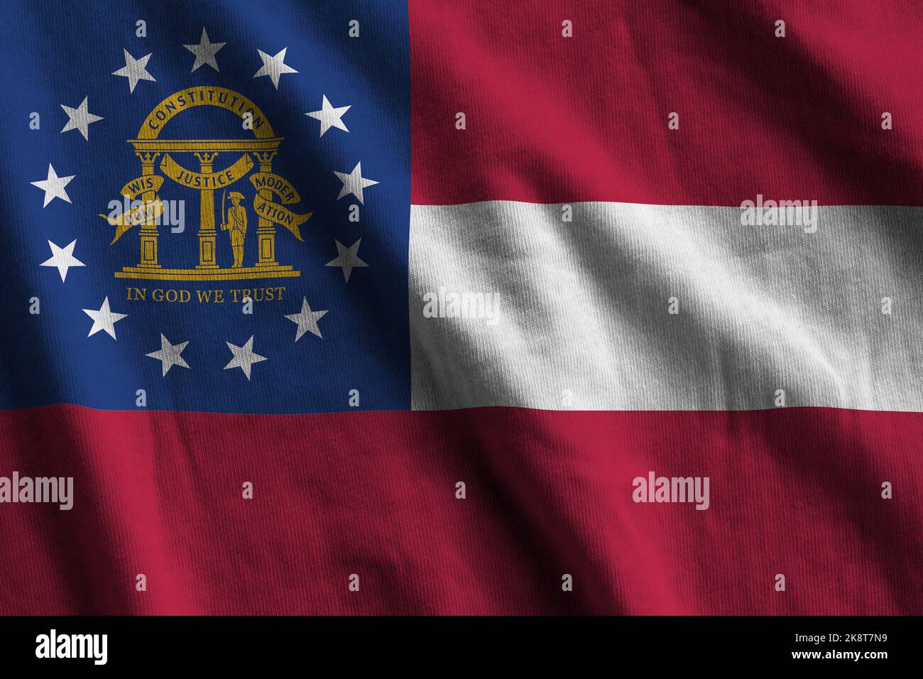 Georgia US state flag with big folds waving close up under the studio ...