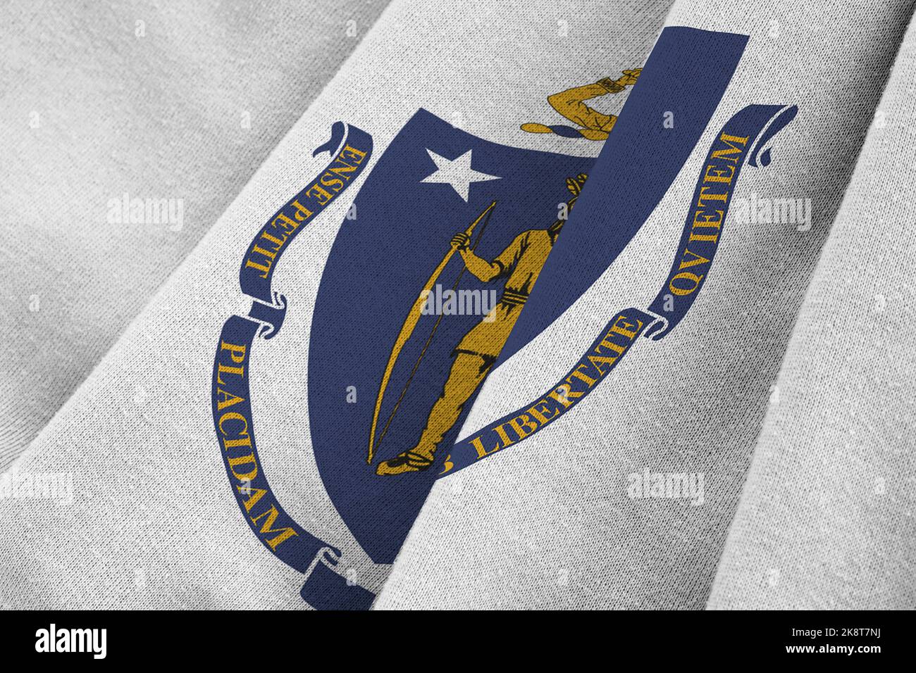 Massachusetts US state flag with big folds waving close up under the ...