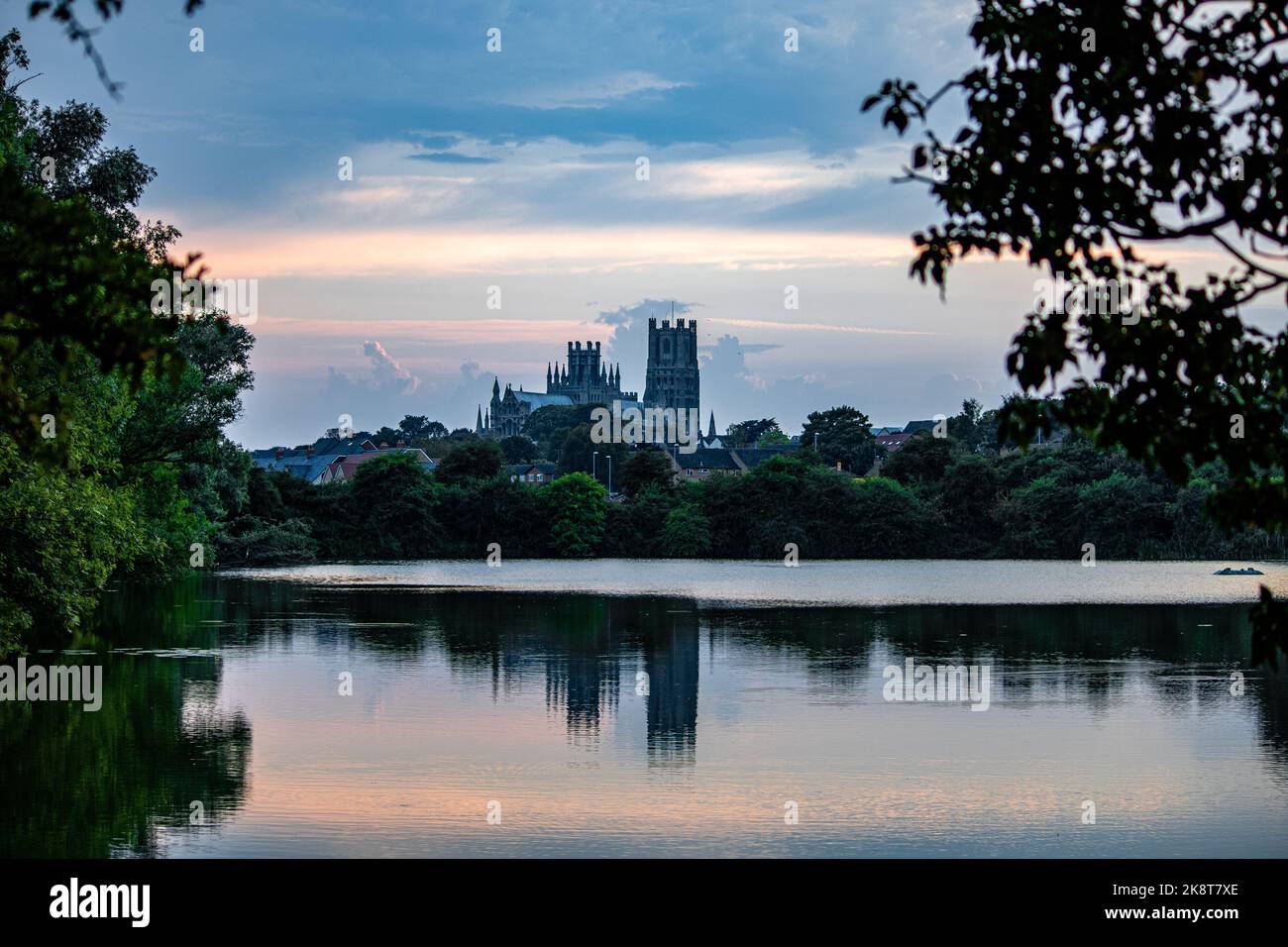 A scenic view of the architecture behind the beautiful lake during ...