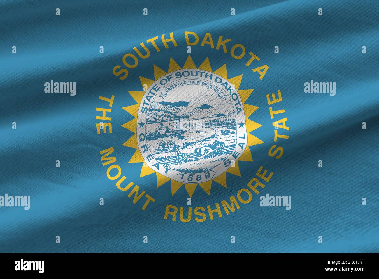 South Dakota US state flag with big folds waving close up under the ...