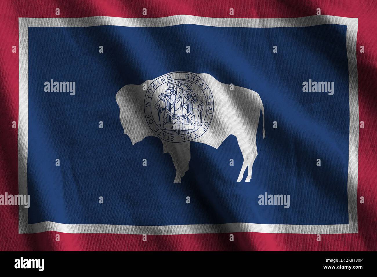 Wyoming US state flag with big folds waving close up under the studio ...