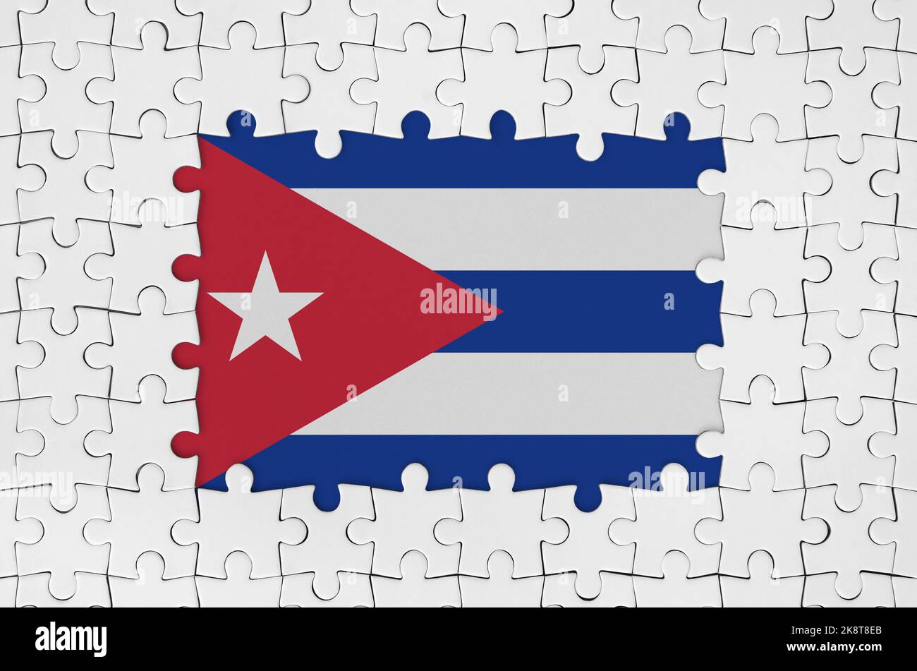 Cuba flag in frame of white puzzle pieces with missing central parts ...