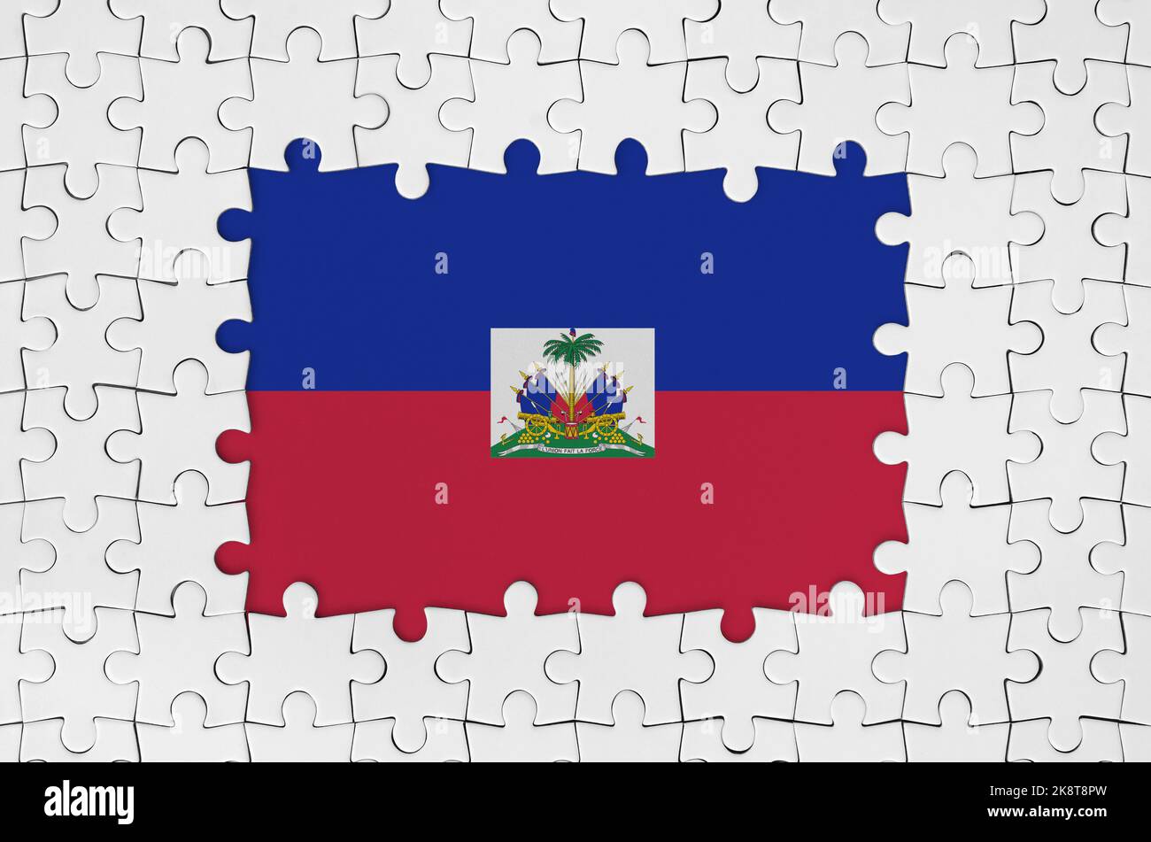 Haiti flag in frame of white puzzle pieces with missing central parts ...