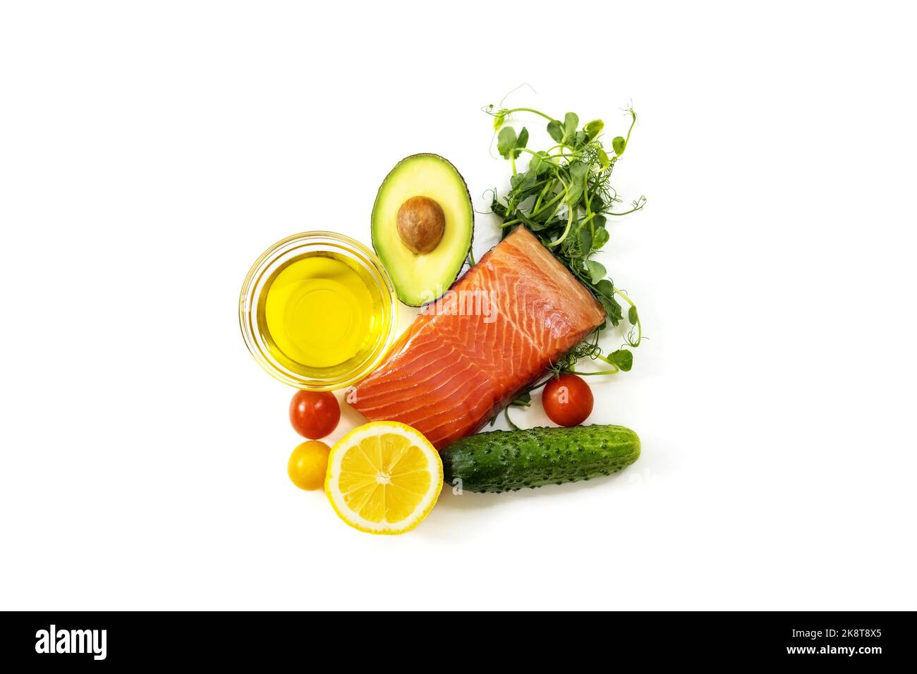 Ingredients of healthy food. Fish, micro green pea sprouts, olive oil ...