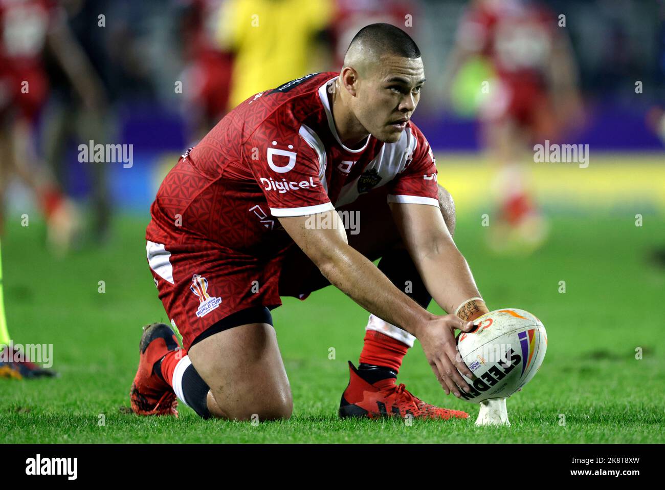 Tonga's Tui Lolohea scores their side's first conversion of the game ...