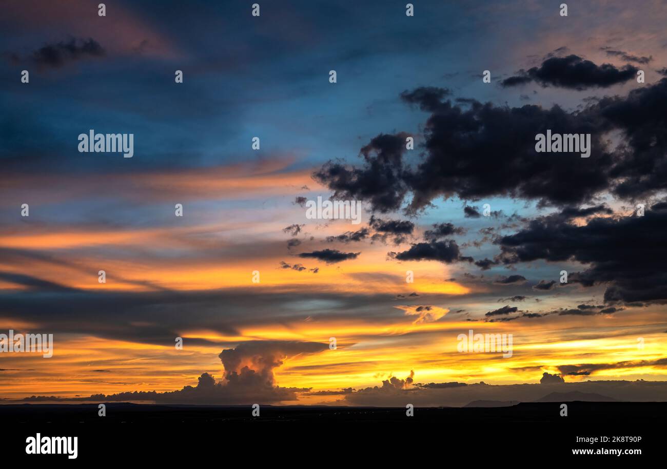 Beautiful Sunset Cloudscape With Bright Orange And Yellow Clouds In