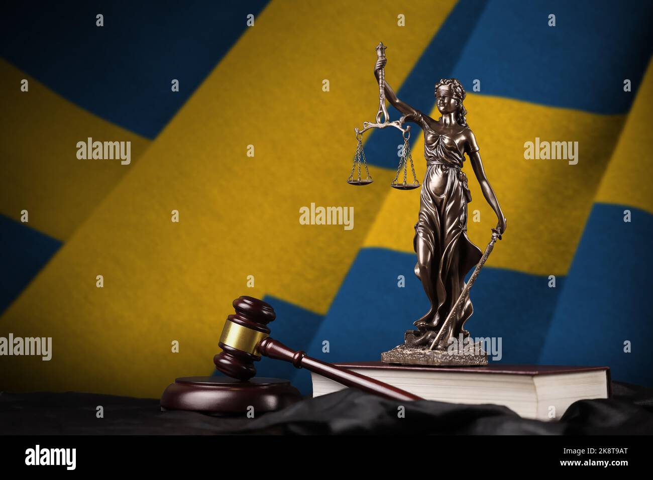 Sweden flag with statue of lady justice, constitution and judge hammer ...
