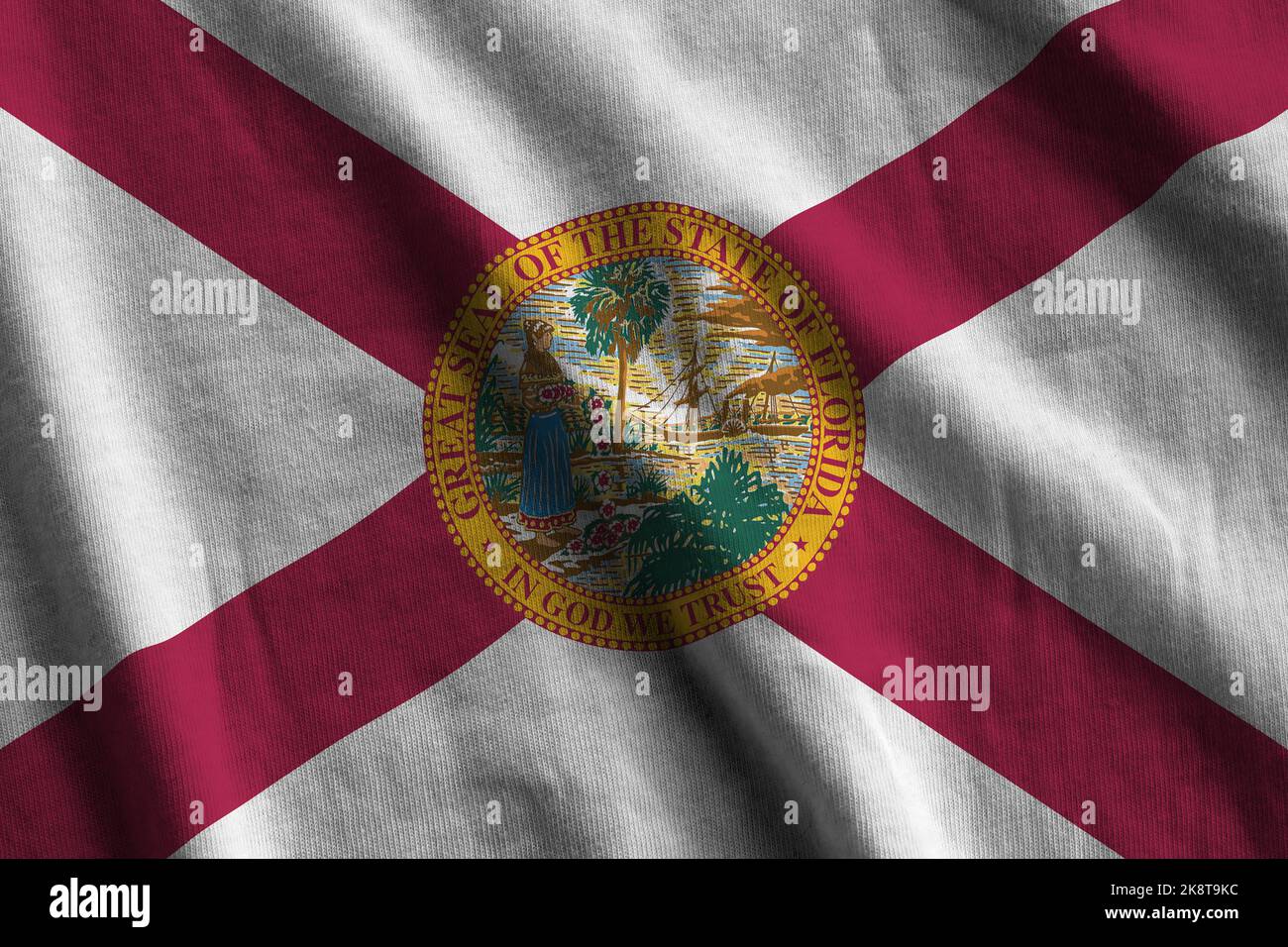 Florida US state flag with big folds waving close up under the studio ...