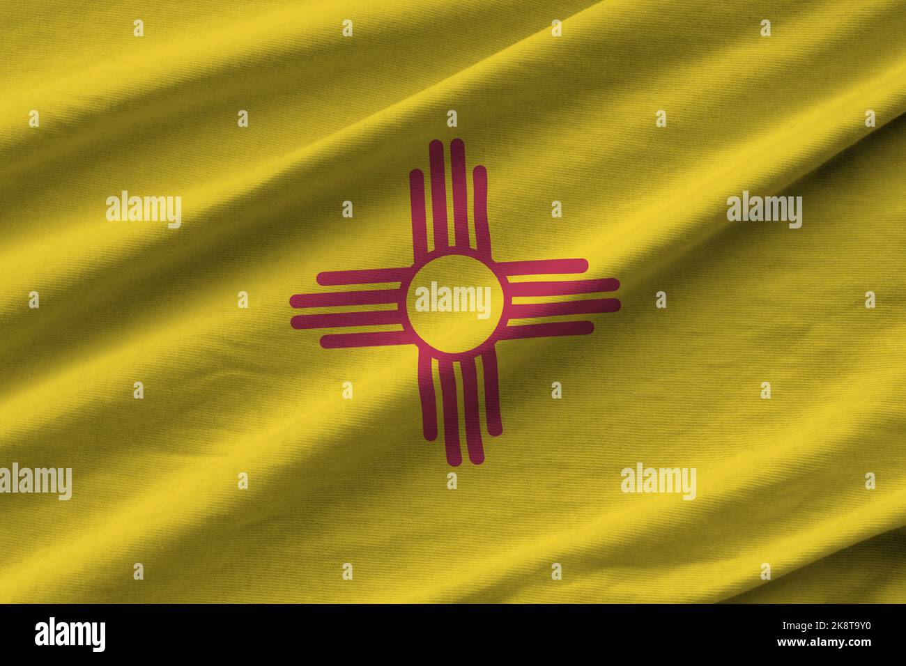New Mexico US state flag with big folds waving close up under the ...