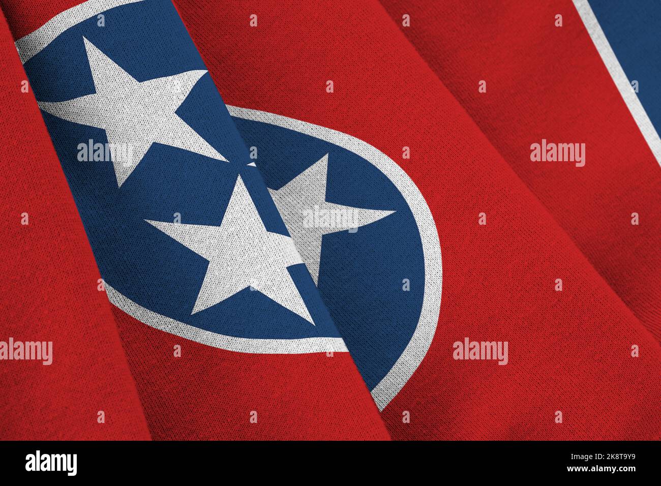 Tennessee US state flag with big folds waving close up under the studio ...