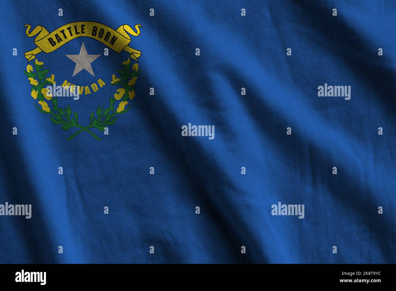 Nevada US state flag with big folds waving close up under the studio ...