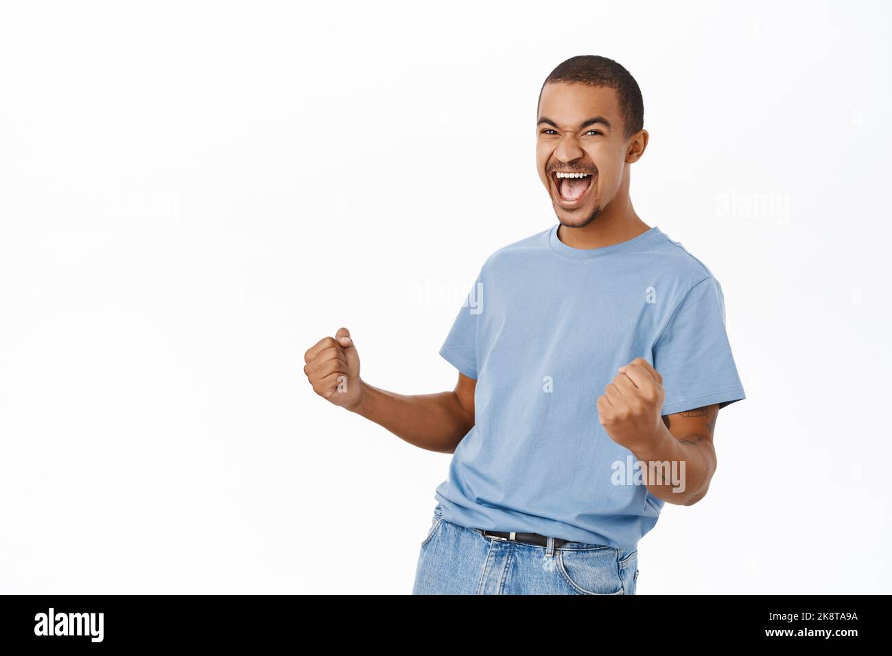 Win, triumphing people. Happy arab man cheering, celebrating victory ...