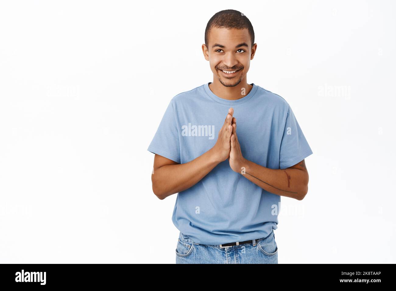 Thoughtful Arab Man Rubbing Hands And Thinking Pleased Has An Idea Standing Over White