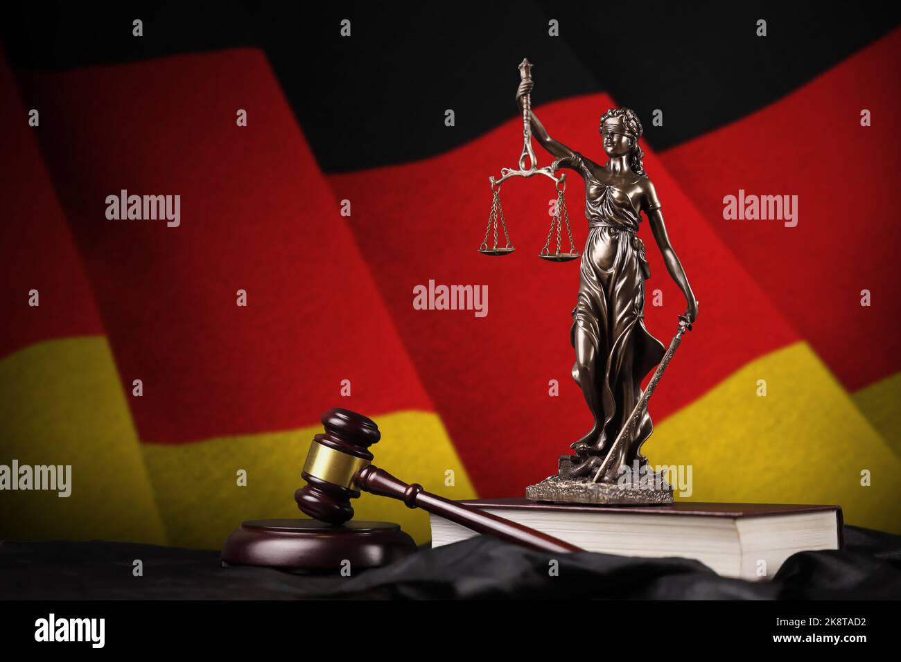 Germany flag with statue of lady justice, constitution and judge hammer ...