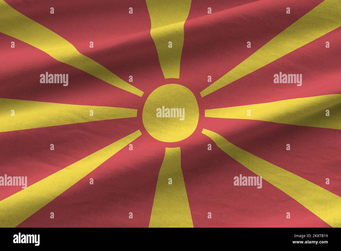 Macedonia flag with big folds waving close up under the studio light ...