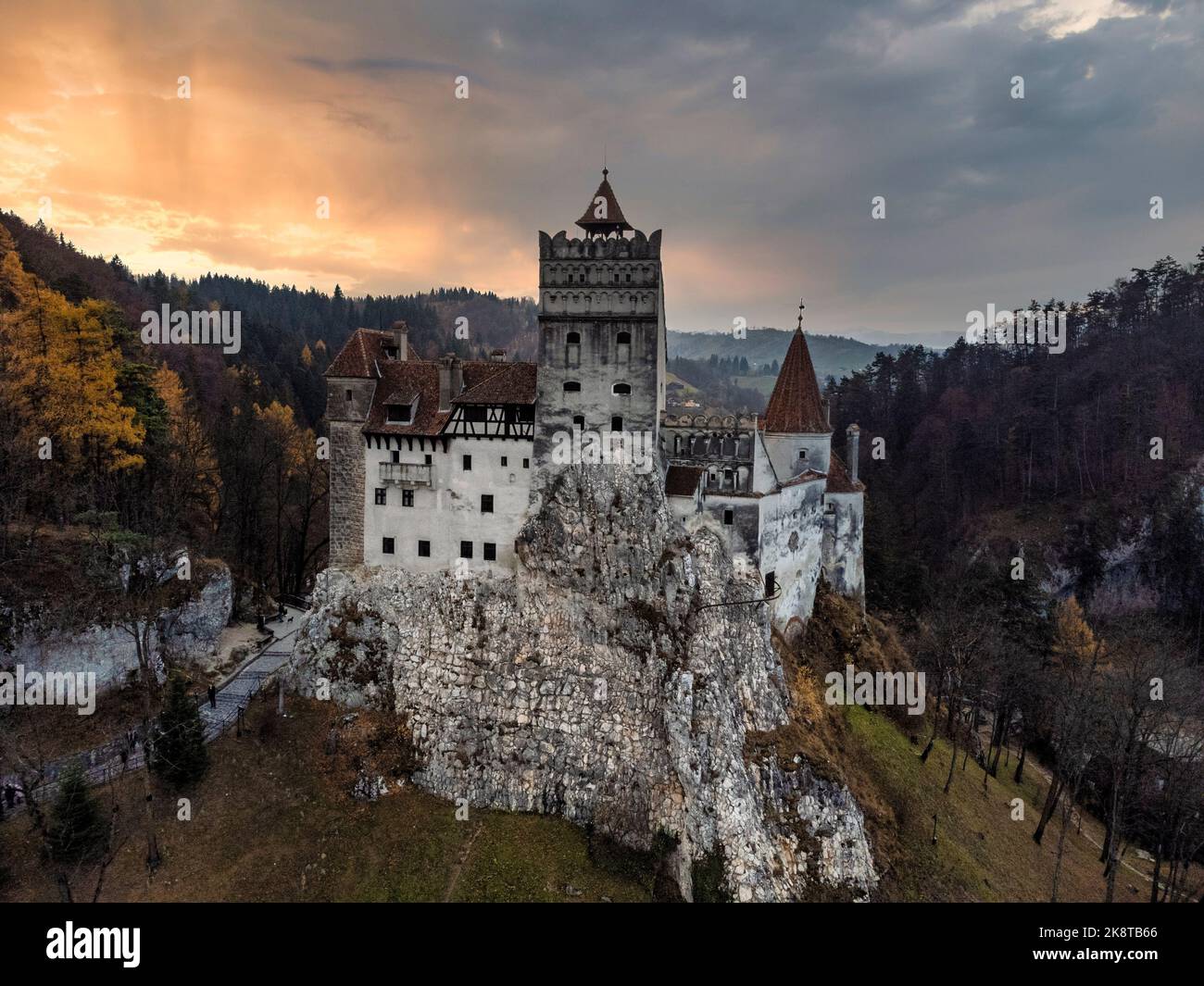 The historic Bran Castle (Dracula's Castle) surrounded by a forest ...