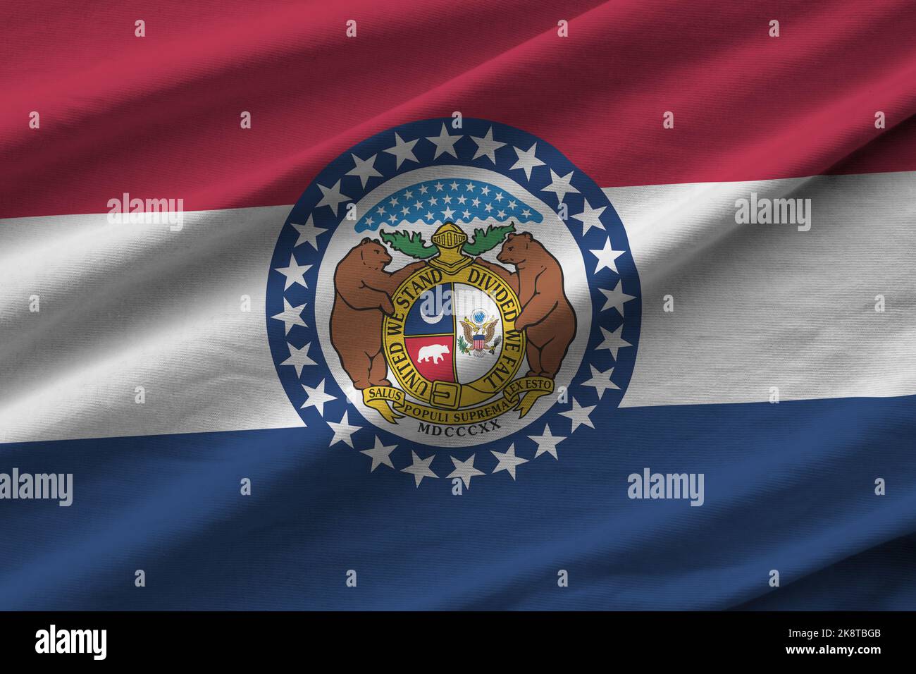 Missouri US state flag with big folds waving close up under the studio ...