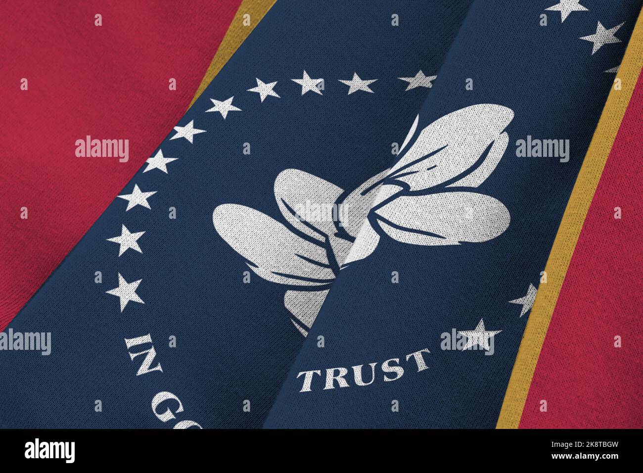 Mississippi new US state flag with big folds waving close up under the ...