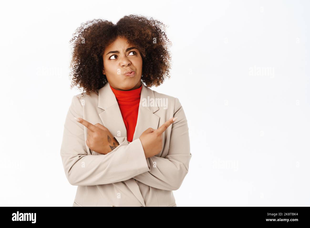 African american businesswoman thinking with puzzled face, pointing ...