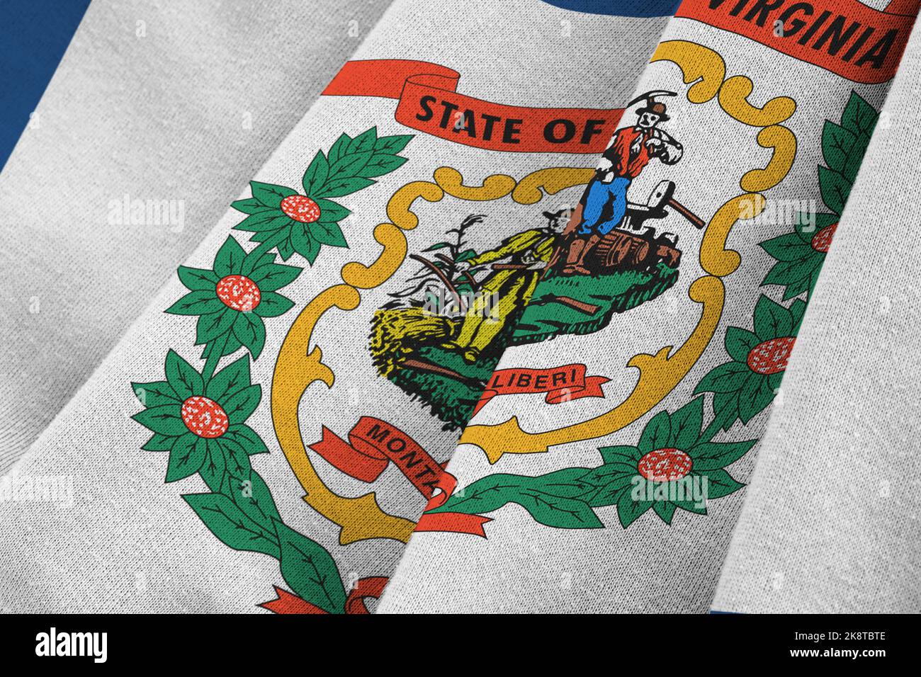 West Virginia US state flag with big folds waving close up under the ...
