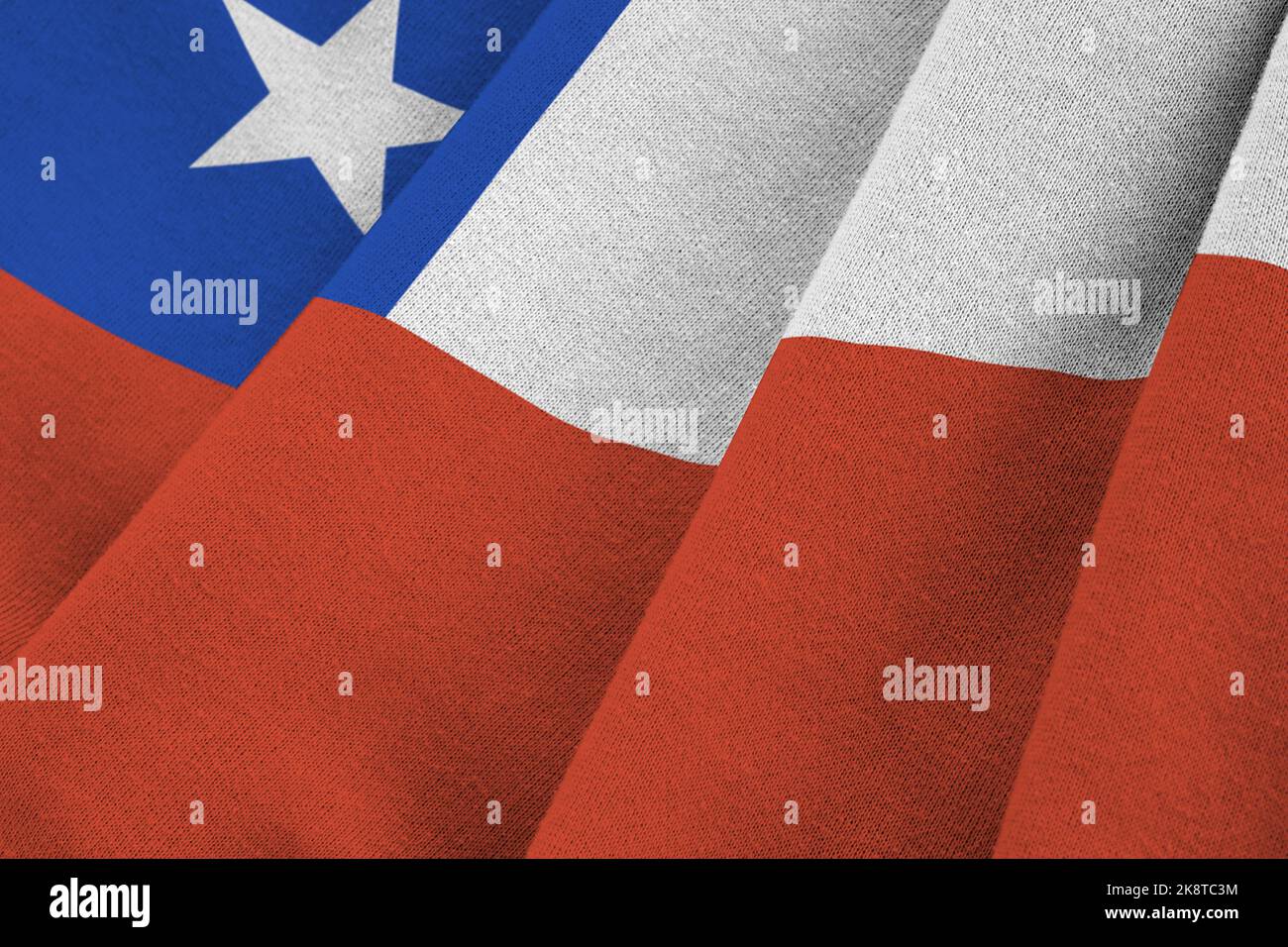 Chile flag with big folds waving close up under the studio light ...