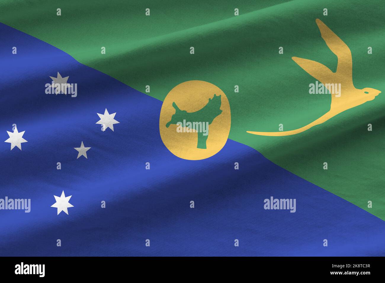 Christmas island flag with big folds waving close up under the studio ...