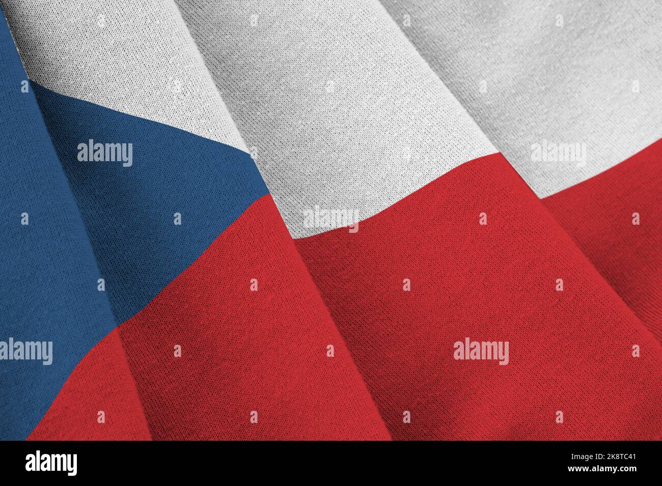 Czech flag with big folds waving close up under the studio light ...