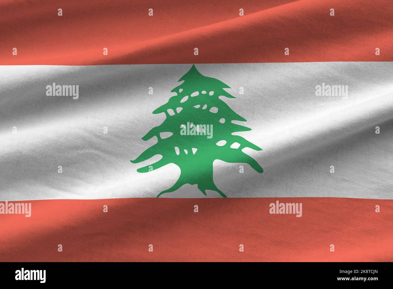 Lebanon flag with big folds waving close up under the studio light ...