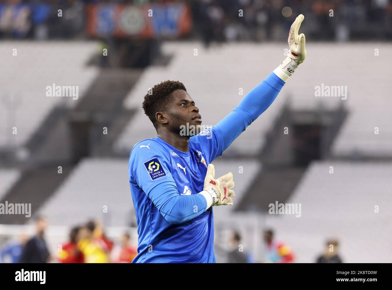 Goalkeeper of Lens Brice Samba celebrates the victory following the ...