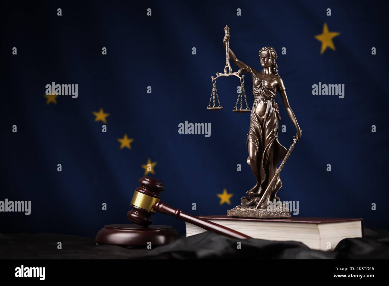 Alaska US state flag with statue of lady justice, constitution and ...
