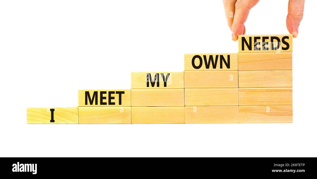 I meet my own needs symbol. Concept words I meet my own needs on wooden ...