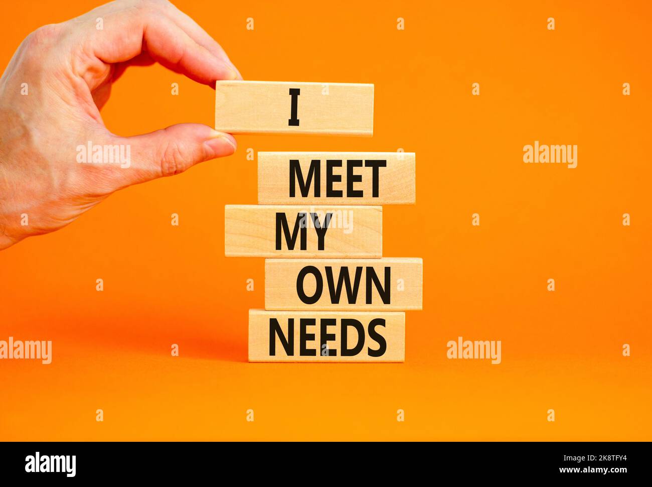 I meet my own needs symbol. Concept words I meet my own needs on wooden ...