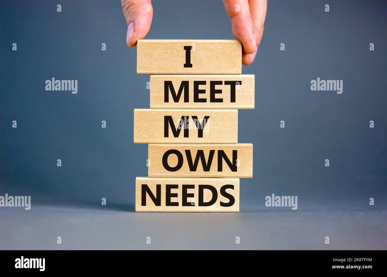 I meet my own needs symbol. Concept words I meet my own needs on wooden ...