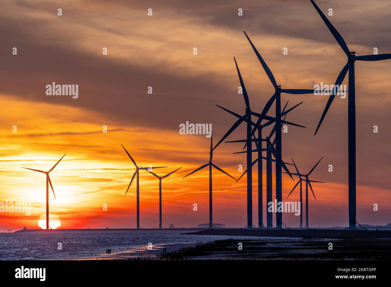 Sunrise and onshore wind turbines hi-res stock photography and images ...