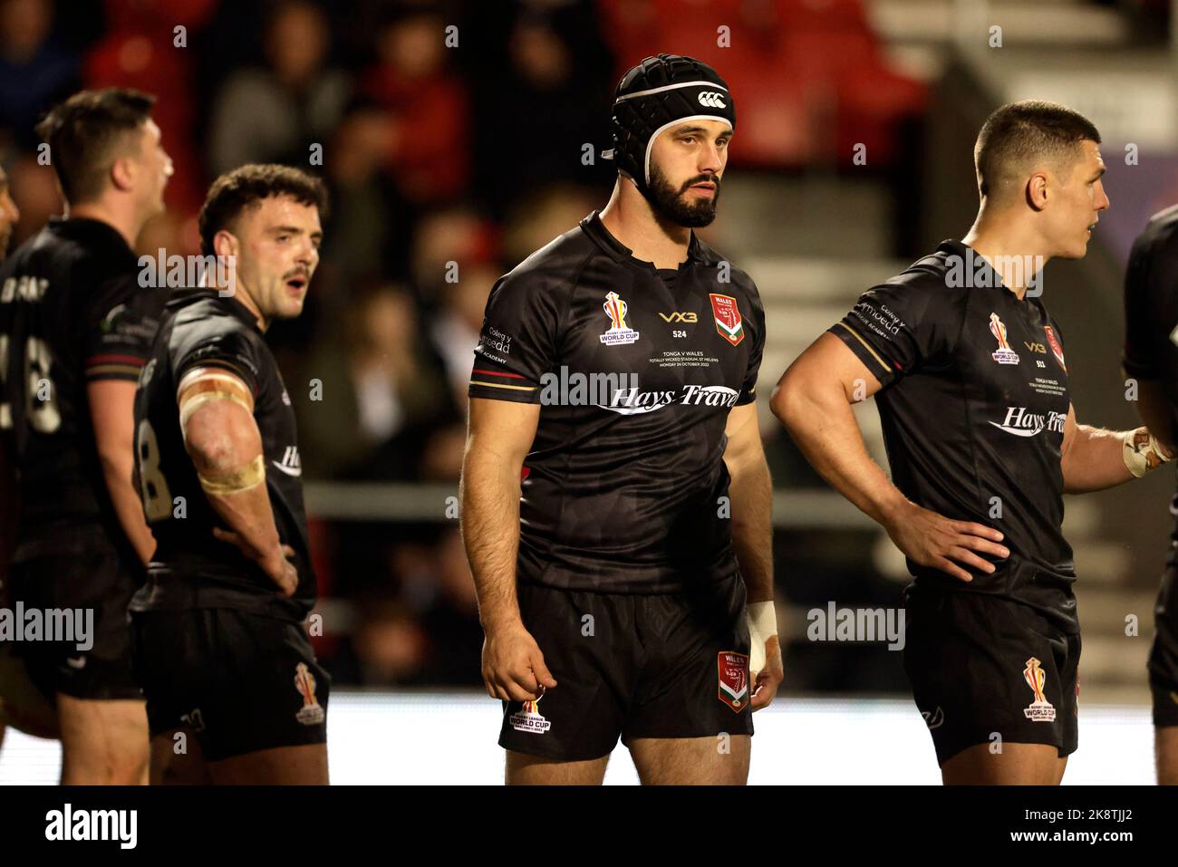 Wales' Thomas Hopkins (centre) and team-mates looking dejected during ...