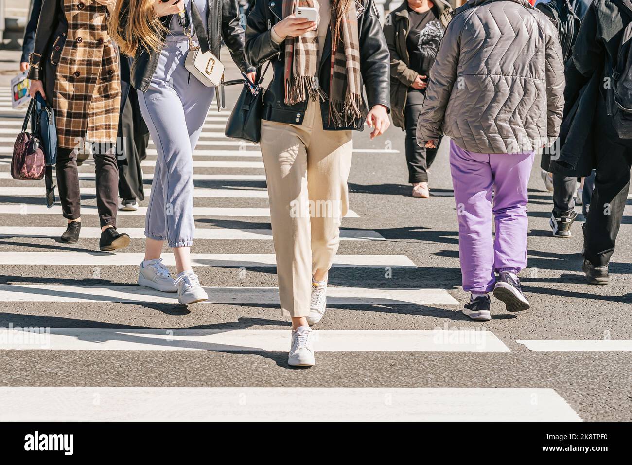 Person crossing the street hi-res stock photography and images - Alamy