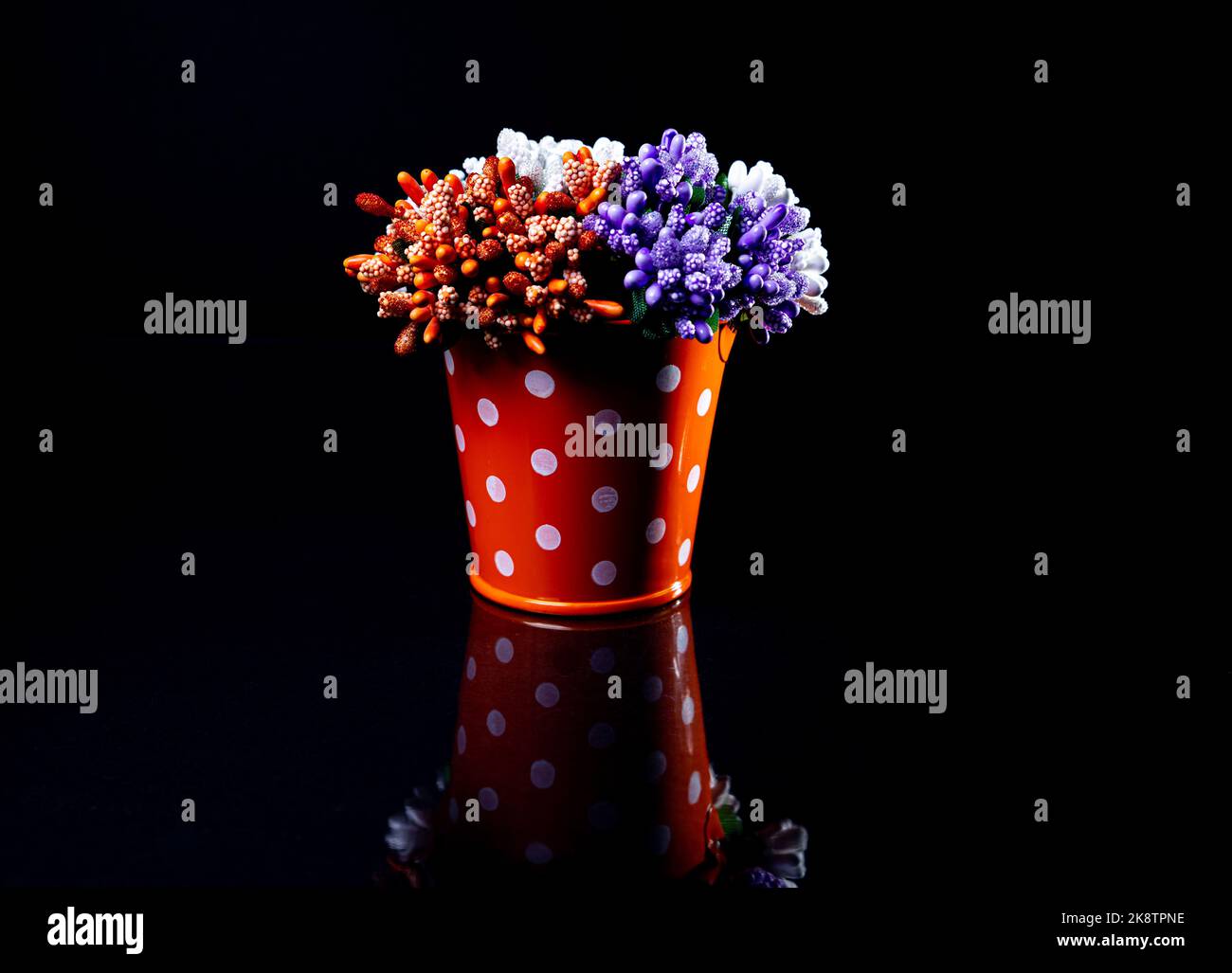 aluminum ice bucket laid in wait for use. stainless multi-colored ...