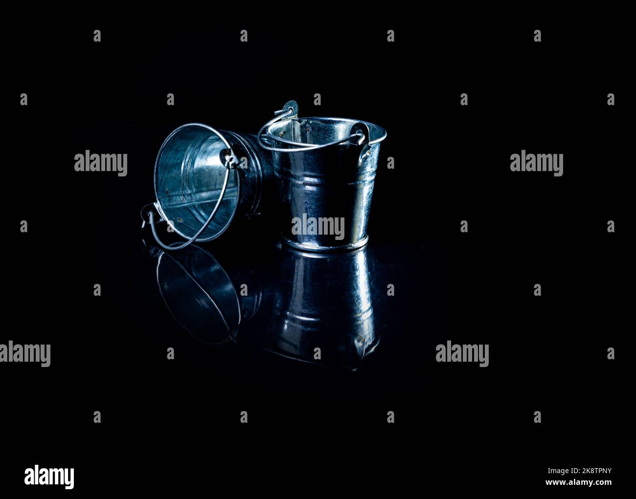 Many aluminum ice bucket laid in wait for use. many stainless multi ...