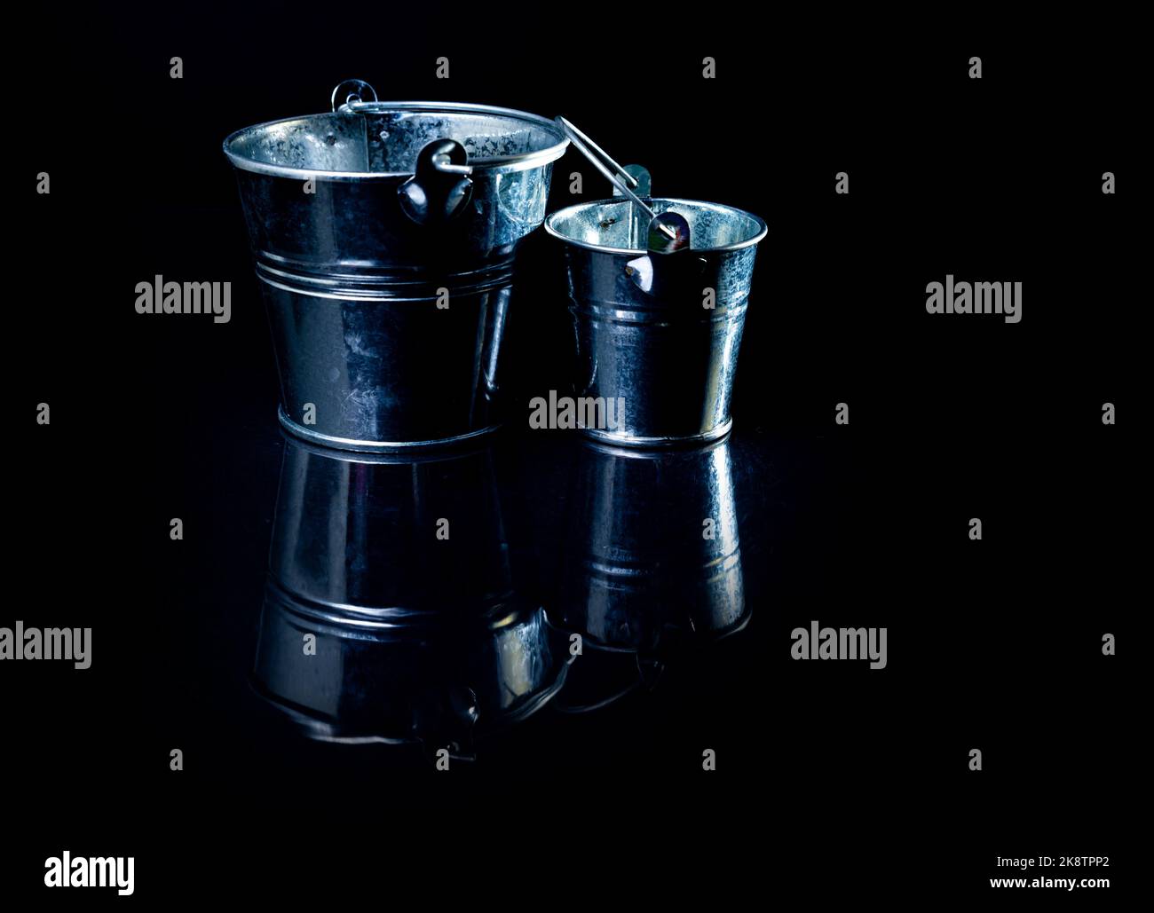 Many aluminum ice bucket laid in wait for use. many stainless multi ...
