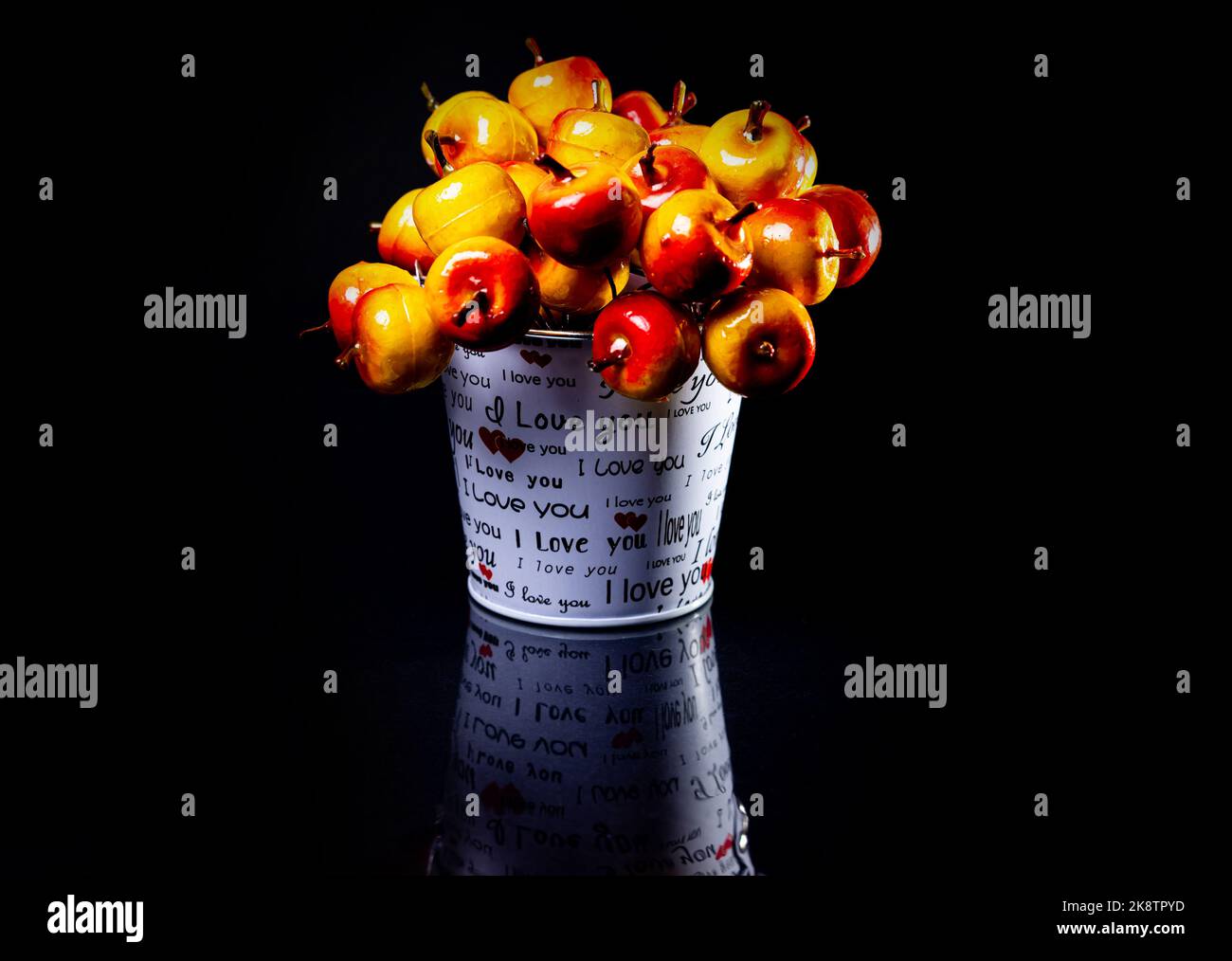 aluminum ice bucket laid in wait for use. stainless multi-colored ...