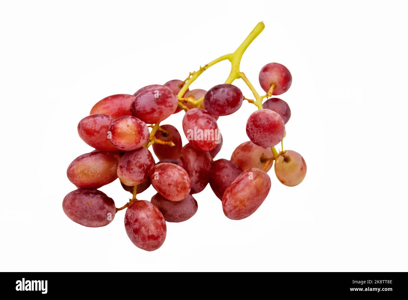 Red grapes on a white background Stock Photo - Alamy