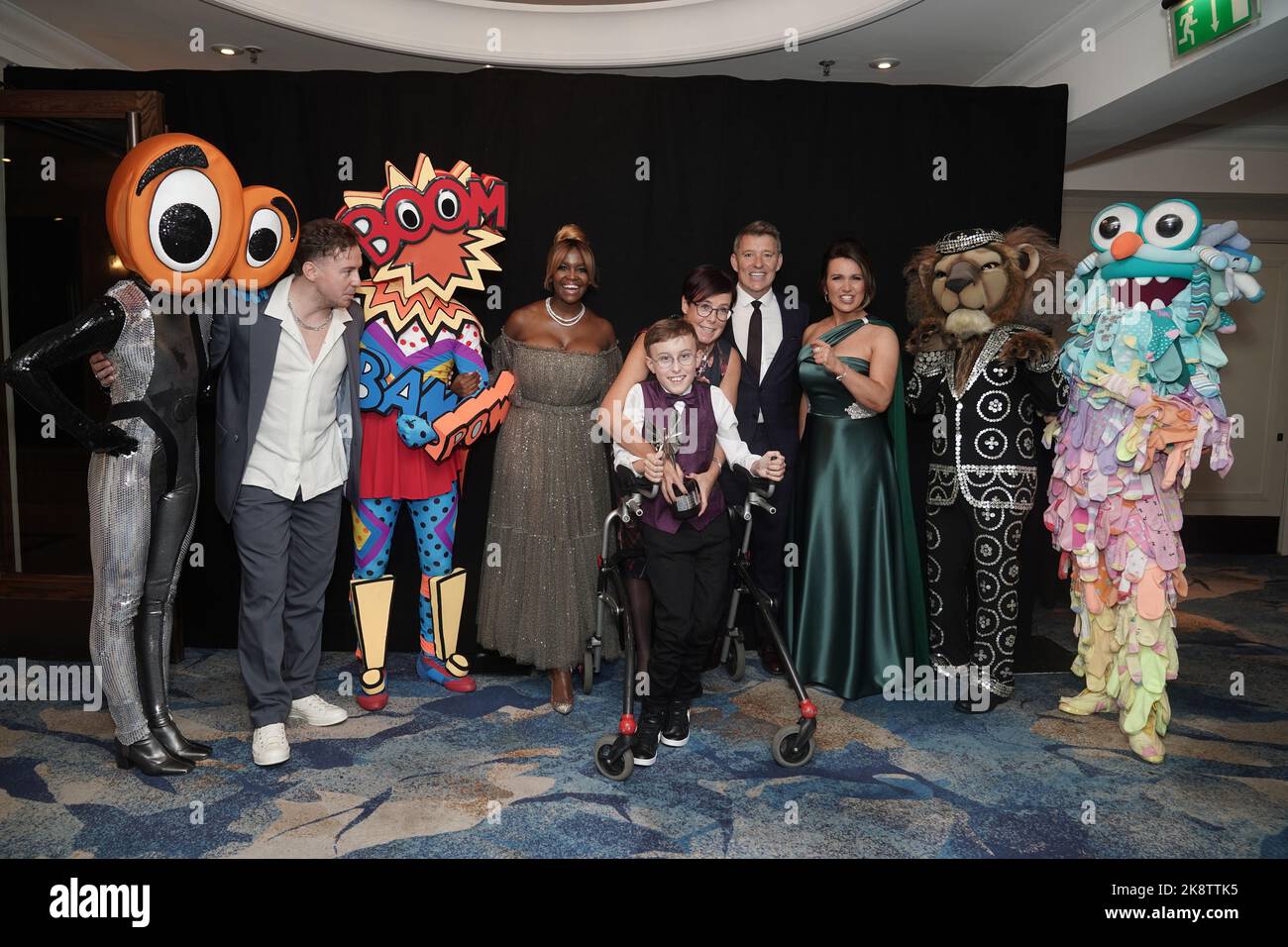 Tobias Garbutt Weller (centre) with his mum Ruth holding his Good ...