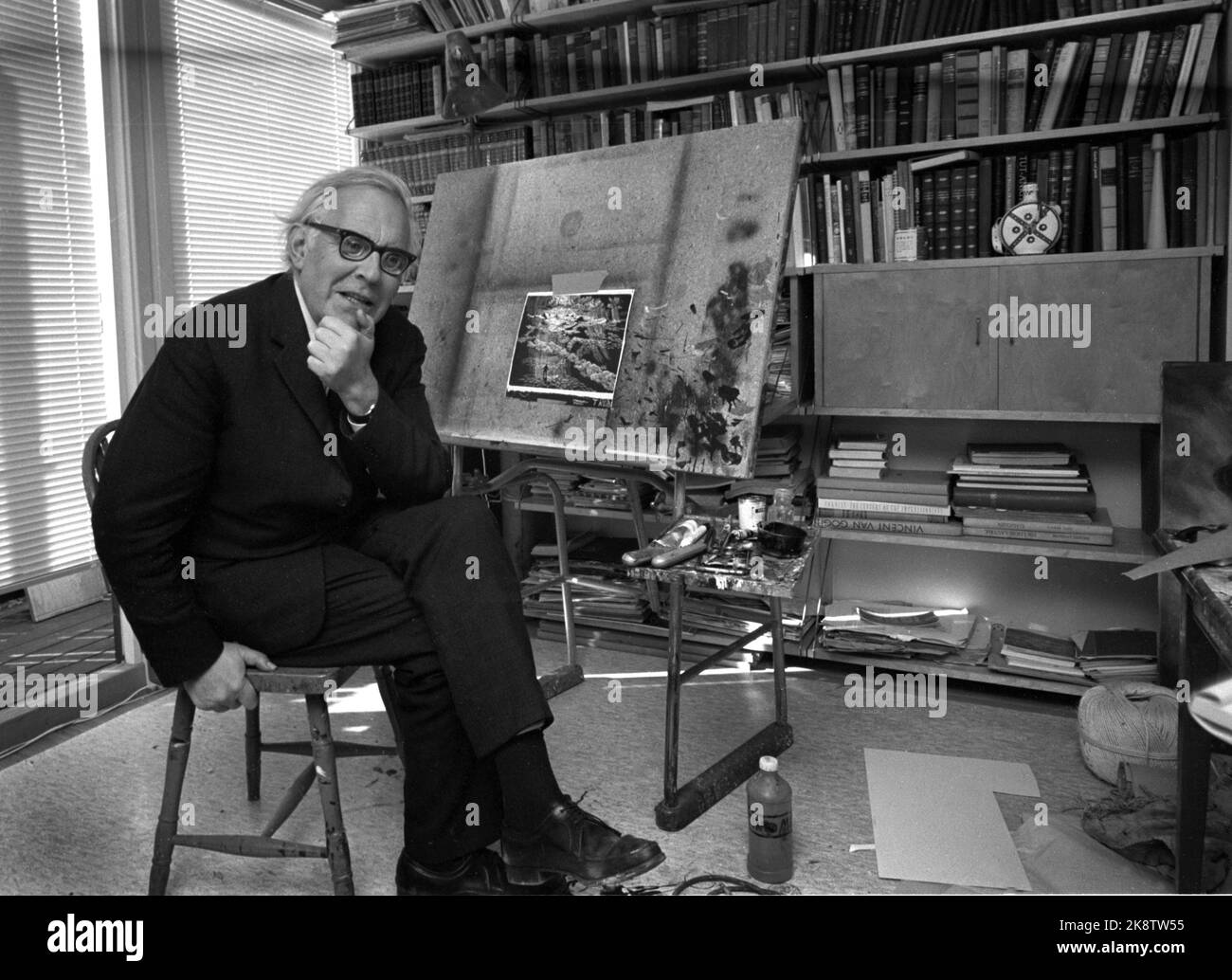 196811 The artist Kaare Espolin Johnson sits at home in his studio ...