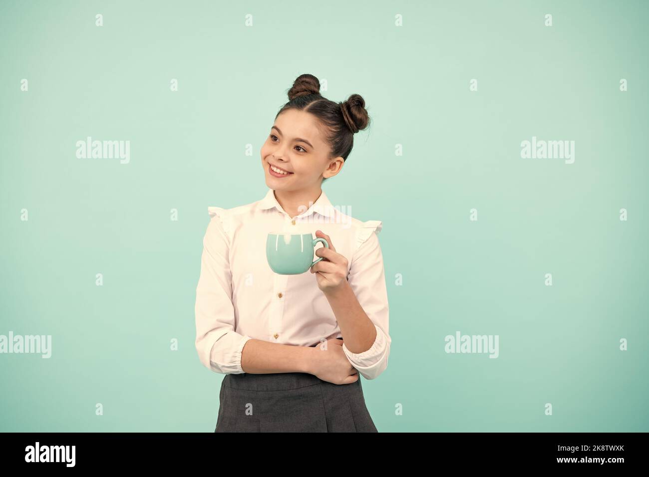Teen girl holding coffee cup. Coffee break and recess. Teenager hold ...